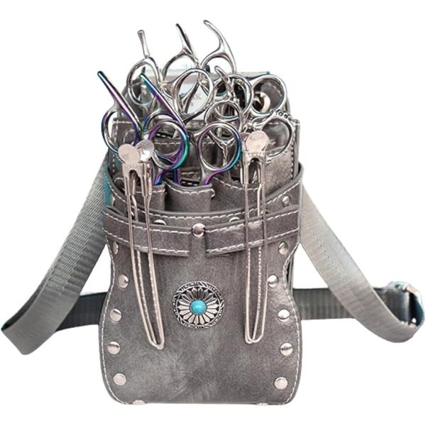 バリエーションコード : 2B9W9UIHN3美容師、トリマー、フローリストなど、ハサミ（シザー）を取り扱う職業の人に欠かせないアイテムのシザーケース。ハサミを入れるためのケースですが、コームやその他のこまごましたアイテムも収納可能。水濡れ...