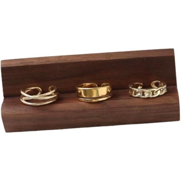 バリエーションコード : 2B9WXSNVHG「木製リングスタンド」木目が美しい木製のリングスタンドです。クルミ（ウォールナット）の深い色のリングホルダーなのでアクセサリーが映えます。しっとりとした質感で、どんな店舗やインテリアにもなじみま...