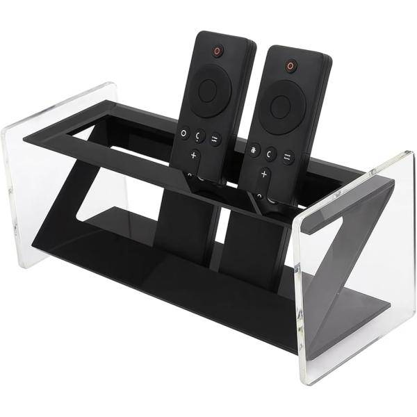 バリエーションコード : 2BU1KV1G5V「商品説明」スタイリッシュにリモコンやスマホを収納できる卓上スタンドです。透明アクリルとブラックパネルを組み合わせたシンプルでモダンなデザインは、リビングやオフィスのインテリアにも自然に溶け込み...