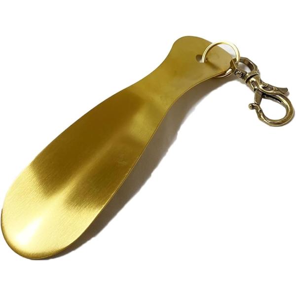 バリエーションコード : 2BU5SORQ42携帯して持ち運びやすい真鍮製の短ヘラ靴ベラになります。美しい真鍮製を使用し、キーホルダーとしても使えるフック付きカバン、バッグ、ジーンズに取付けなどもかっこよくできるのが可能になるアイテムgoo...