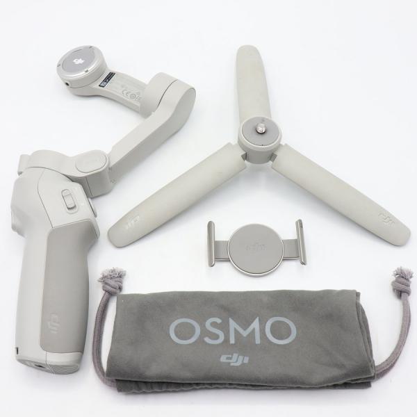 DJI OM 4 OK100 ハンドヘルド スマートフォン ジンバル スタビライザー■商品状態【B】一般的な使用感のある商品・本体と三脚に使用に伴う擦れキズや汚れがございます。・三脚の上部のスポンジに破れがございます。・動作確認済みのためご...