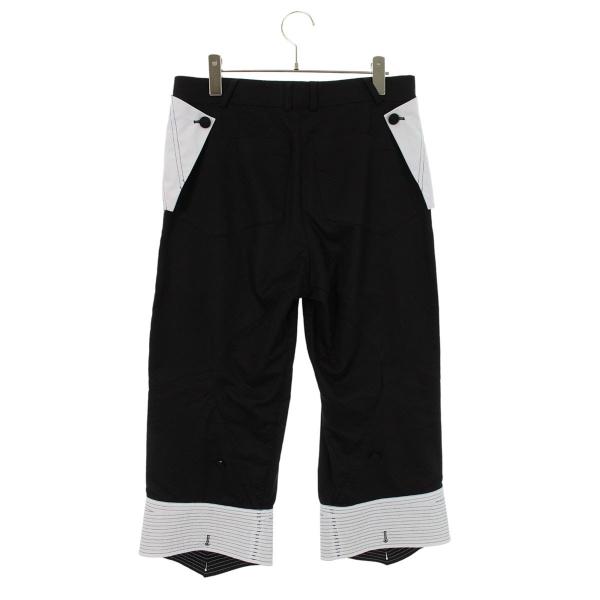 ブランド：キココスタディノフ/KIKO KOSTADINOV商品名： 21SS  00102021 SFORZA FLAPPED HEM TROUSERS フラップドヘムクロップドロングパンツサイズ：46状態ランク：Bカラー：ブラック