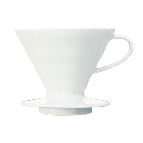 コーヒー粉の層が深くなるセラミック製「円すい形」コーヒードリッパー。1〜4杯用です。旨みをしっかり抽出します。大きなひとつ穴なので、お湯を注ぐ速さを変えることでコーヒーの味が変化します。早く注げばスッキリと、ゆっくり注げば深いコクが味わえま...