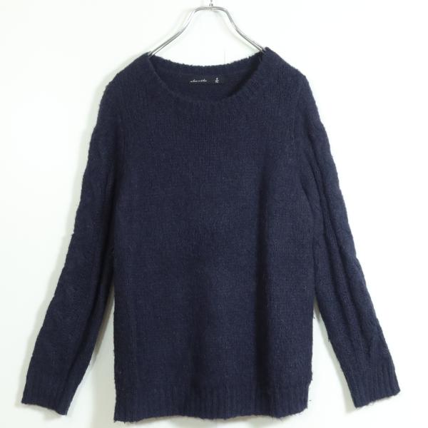 【商品説明】【実寸約】肩幅41袖丈64バスト98着丈66(cm)【サイズ表記】  ＊【素材】アクリル70ナイロン10毛10アルパカ10【状態】普通の使用感のあるお品物毛羽立ち感あり。【デザイン】ネイビー系袖はアラン編みの長袖セーターです。無地