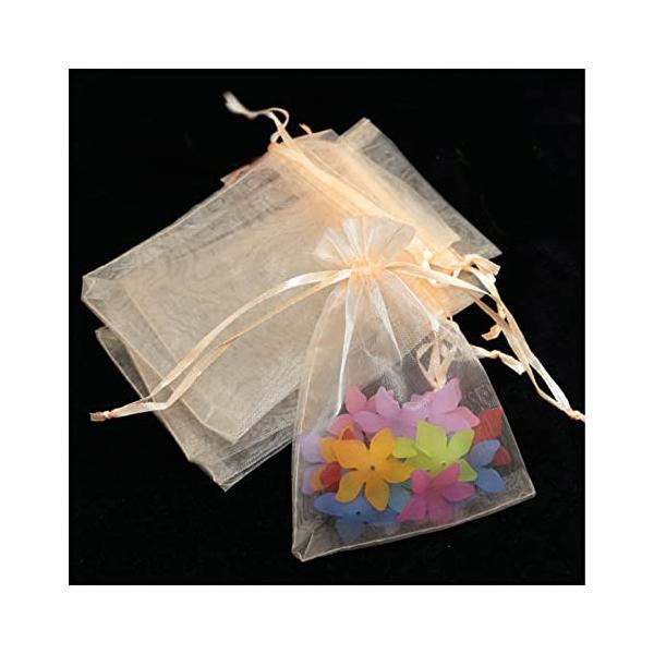 オーガンジー 巾着袋 : 透け感があり、丈夫なオーガンジー 生地で色々なシーンに役に立ている巾着袋です。ラッピング 袋: 手作りお菓子や小物などを入れてリポンを締めるだげで完成の大容量 プレゼント 袋になります。小分け袋 : サイズ17*2...