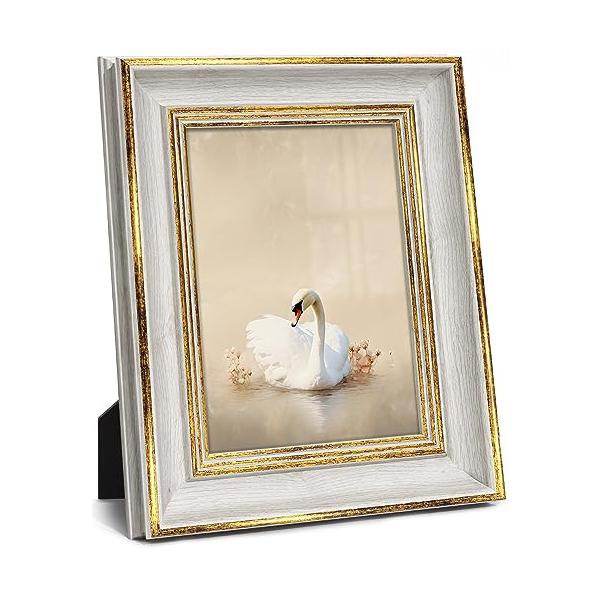 アンティークの額縁：ホワイト・ゴールドを基調としたアンティークのデザインで、どんな雰囲気の所に飾っても違和感なくお洒落になります。環境に優しい素材：軽量で耐久性の高いPS材を使用し、丈夫でありながら木製フレームの美しさを引き出します。壁掛け...