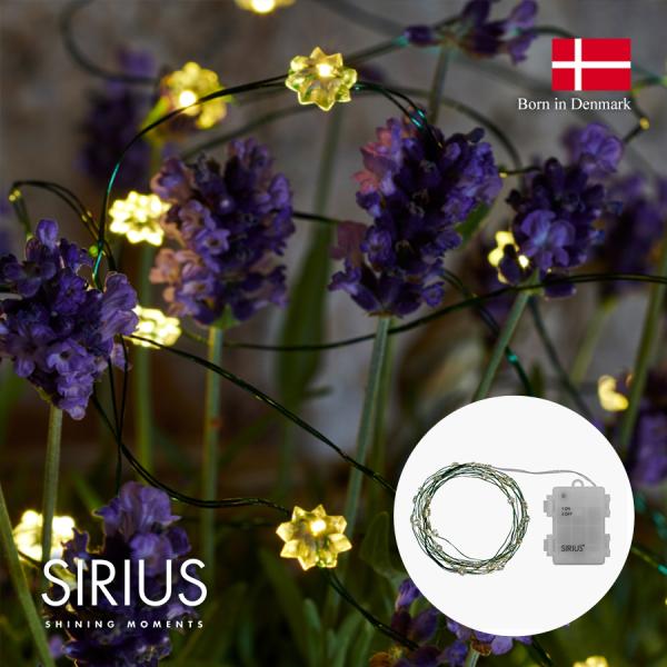 デンマーク生まれの照明ブランド"SIRIUS"のLEDライトチェーン"Silke Mini Flower"です。"Silke Mini Flower "は屋外でも使用可能なイルミネーションライトで、約3.9mの長さのチェーンには、小さな花を...