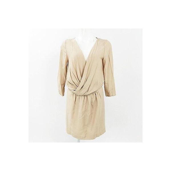 カシュクール風のデザインが大人なワンピース。 肌をきれいに見せてくれる絶妙カラーです。 シンプルなデザインなので、 合わせる小物で雰囲気を色々と変えて頂けますよ。 カジュアルパーティ等にもぴったりですよ！ シワが見られます。    着丈約8...