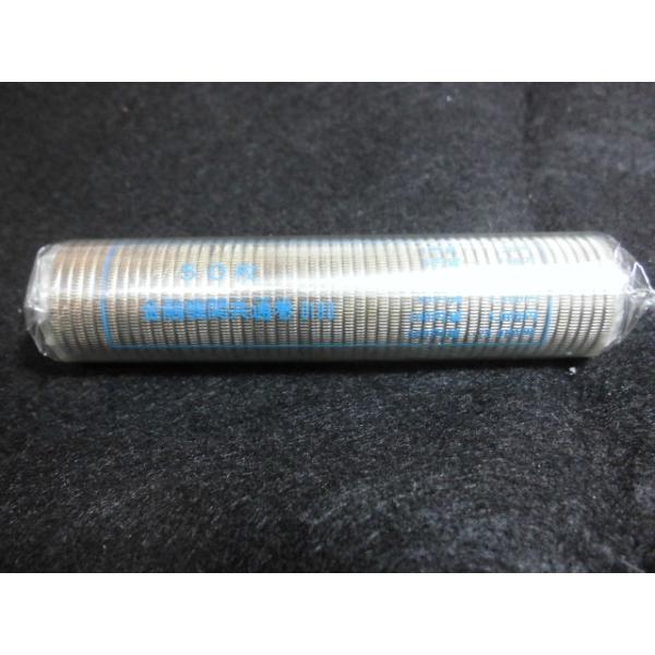 この平成12年号の50円貨幣は、発行枚数が少なくなる平成のトップバッターです。非常に注目されたコインです。発行枚数702万6千枚　直径21ミリ　品位　銅750/ニッケル250　量目4.0ｇ面　菊花