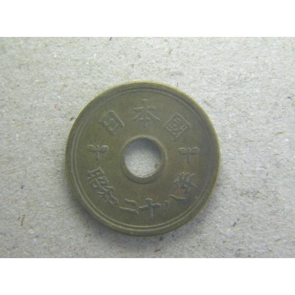 直径２２ミリ　品位銅６０％〜７０％　亜鉛４０％〜３０％　量目３．７５ｇ　面　稲穂、歯車、水面　背　双葉　亜鉛の含有量により、微妙な色違いが存在します。流通品です。