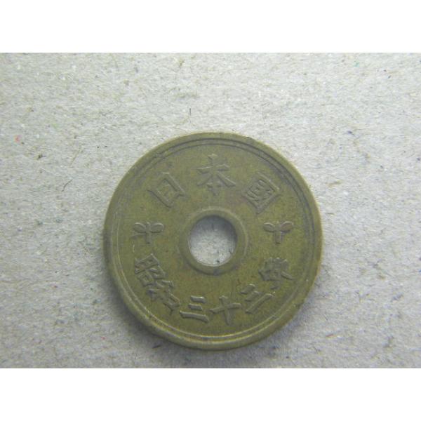 直径２２ミリ　品位銅６０％〜７０％　亜鉛４０％〜３０％　量目３．７５ｇ　面　稲穂、歯車、水面　背　双葉　亜鉛の含有量により、微妙な色違いが存在します。流通品です。