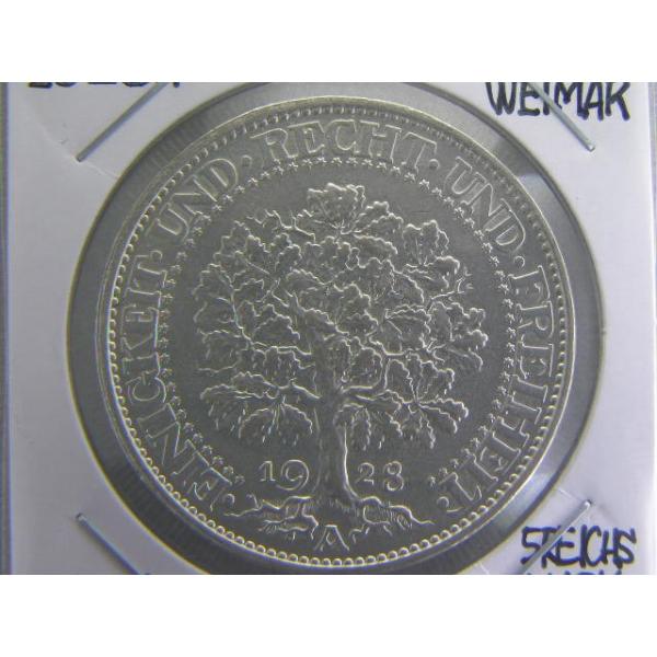 品位　銀50.0％　量目25.0ｇ　　かしわ葉のデザイン