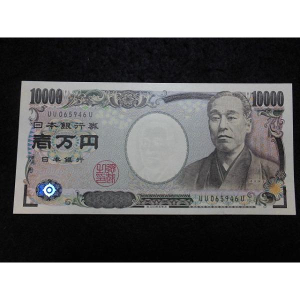 発行　平成16年11月1日　図案　福沢諭吉と鳳凰像　大きさ76ミリ×160ミリ　国立印刷局製造　