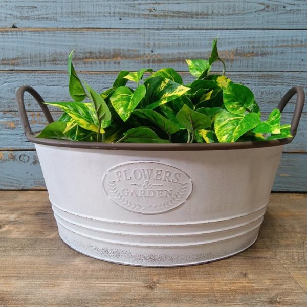 ハンドルを含まないサイズ直径４０×高さ１５センチ底穴ありブリキ製直径４０センチの大きなブリキタライこちらの商品は底面にへこみがありますので画像をご確認の上予めご了承ください。ブリキやスチール製のポットはナチュラルガーデンにおすすめです。底穴...