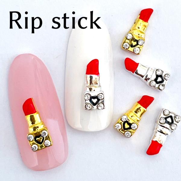 サイズ 　約9ミリ×3ミリ素材：メタル　　AAA品質ガラスストーンかわいい口紅のパーツ小さなハートのデザインで可愛らしいコスメパーツです。ネイルパーツだけでなく、ピアスや洋服に付けても可愛いです。ハンドメイドアクセサリー、ジェルネイル、ピア...