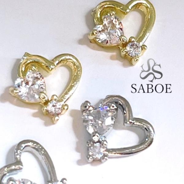 シンプルなデザインのオープンハートジュエリーブライダルネイルにもお使いいただける、ゴージャスなパーツです。ハンドメイド　ピアス　イヤリングラグジュアリーなパーツです。素材：メタル　ジルコニアストーン=====================...