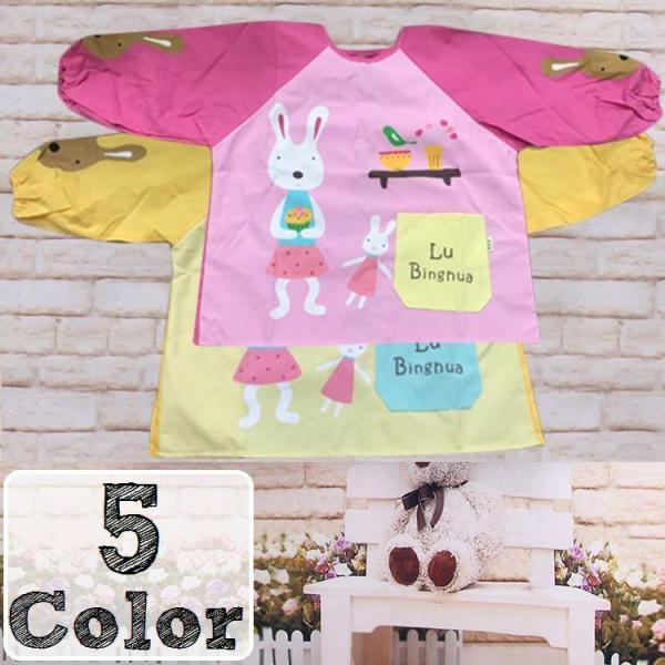 ウサギプリントがとてもキュートなキッズ用長袖スモックです。背中側を紐で結ぶタイプになっています。※生産ロットによりポケット位置やデザインが異なります。画像はイメージとなります※【サイズについて】サイズ：105cm着丈：38cm袖丈：35cm...