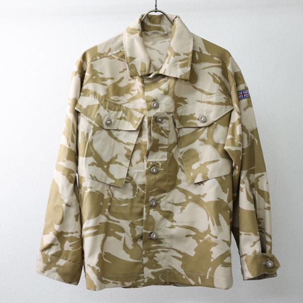 砂漠用のため生地はやや薄手で、通気性をよくするためコットンがメインになっています。・フロントの開閉はボタンのみ。・両サイドの胸ポケット内部にはペンシルポケットが3列あります。・袖口は2つのボタンで調節。・左肩口にイギリス国旗ワッペン付き。・...