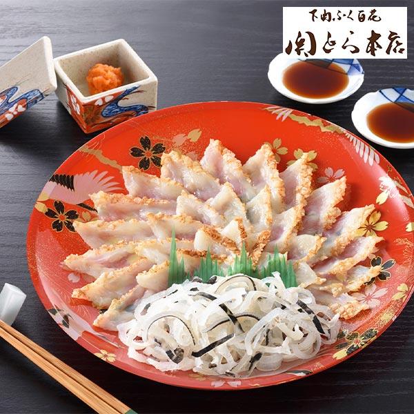 真ふくを炙り、たたきにして1枚1枚丁寧に盛り付けました新鮮なふくの身を強火で炙り冷水でキュッと締めることにより、旨味と香ばしさを加え、１枚１枚丁寧に盛り付けました。また、酒の肴にぴったりなコリコリとした食感のふくの皮もセットになっています。...