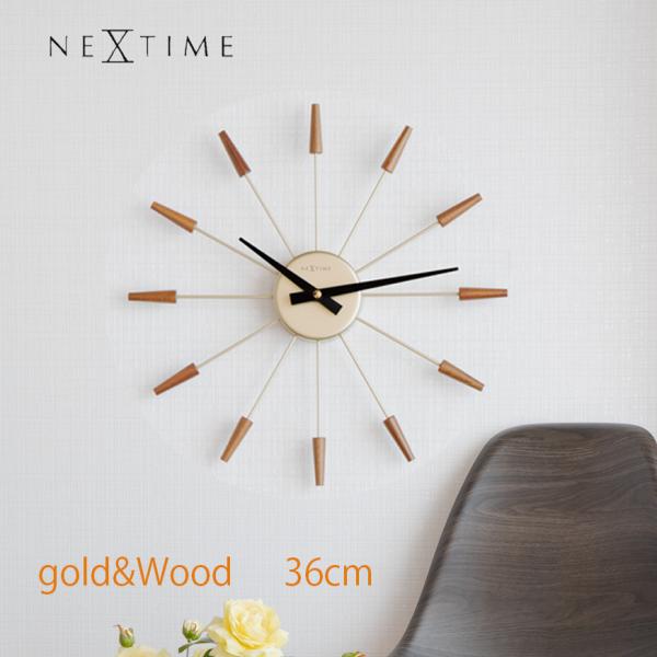 【商品説明】オランダのデザインクロックブランドNEXTIME（ネクスタイム）の代表商品Plug innシリーズのmidサイズ日本のお部屋にマッチします。ゴールドのケースに木製のインデックスの華やかなカラーはシンプルな部屋のアクセントに。太陽...