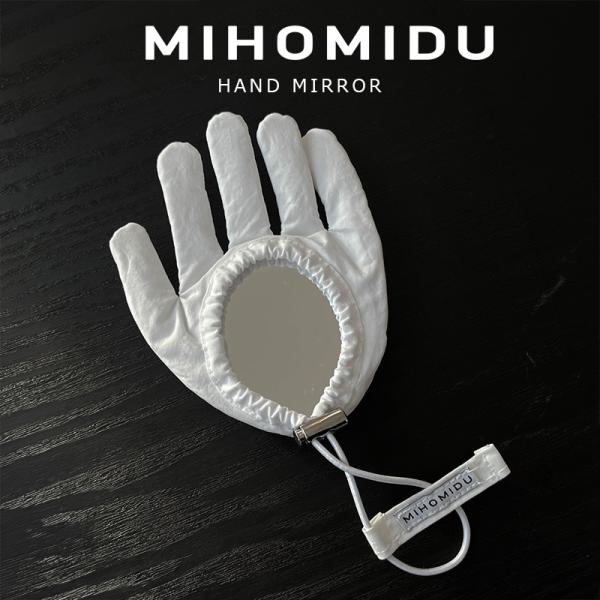 韓国インテリアの人気ブランドMIHOMIDU(ミホミドゥ)のハンドミラーです。ふわふわ素材のクッションフレームと丸みのあるフォルムが可愛いデザインで、SNS映えする手鏡として人気。軽量で持ち運びやすく、メイク直しや自撮りにも最適です。※ハン...