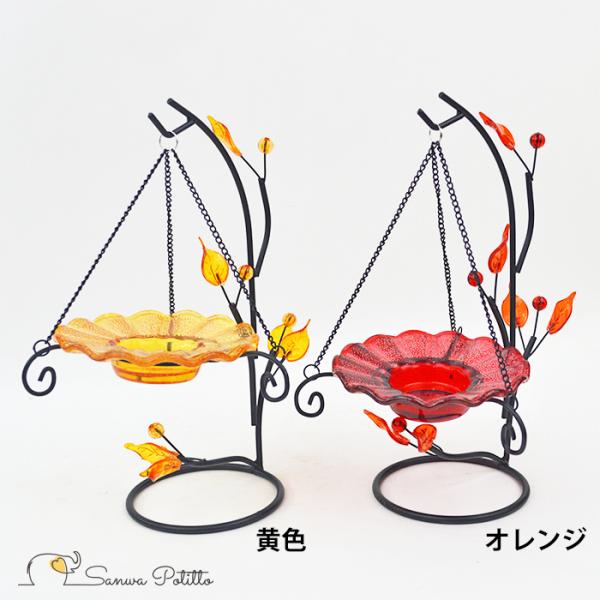 エレガントな雰囲気を演出する吊り下げタイプのキャンドルホルダー。オレンジと黄色のカラーバリエーションで、落ち着いた間接照明を楽しめます。ハロウィンやクリスマスの季節にもピッタリですが、癒しや瞑想の時間を演出するインテリアアイテムとして日常使...