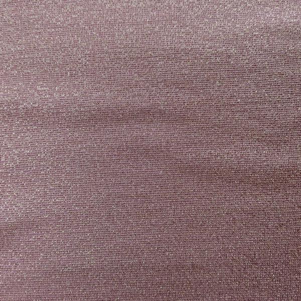 PEラメ入りファンシーニット（sale030）スモークピンク素材： ポリエステル100%生地巾：150cm x 3.3mmade in Japan*ネコポス便：発送不可商品です*細かいラメが全体的に散りばめられたやや薄地で柔らかみのあるニッ...