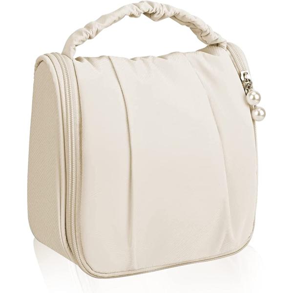 必要な物を一式入れる。メインポケットは広いスペースがあり、ゴムバンドで仕切られており、化粧品ボトルを直立させて液体化粧品の漏れを防ぐことができます。メッシュバッグはメイクブラシ、歯ブラシ、マスカラなどの小物が気楽に入れられて、取り出しにも便...