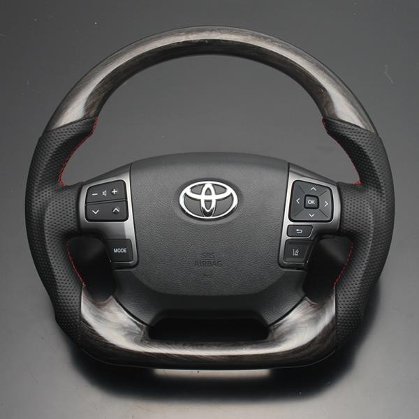 メーカー：ルナインターナショナルブランド：FEGGARI / フェガーリ品名：Dタイプ プレミアムスポーツステアリング(純正交換)メーカー型番：LSP01レザー：PVC(ダークグレー)カラー：ウズラ木目適合車種：ハイエース/レジアスエース年...