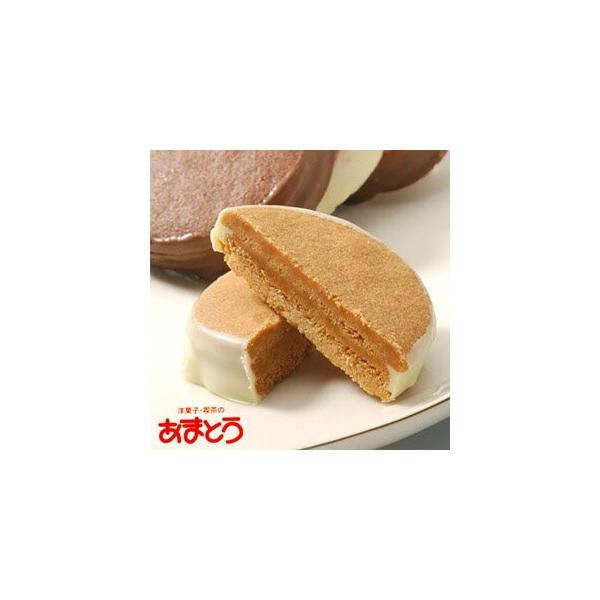 サクッとした口当たりの三枚重ねのサブレーと、オリジナルチョコレートのハーモニー。日持ちも良く、アーモンド、チーズ、カカオ、ウォナッツの４種類。発売以来49年、あまとうの伝統の味をお楽しみください。商品名：クッキー内容量：4個原材料：[カカオ...