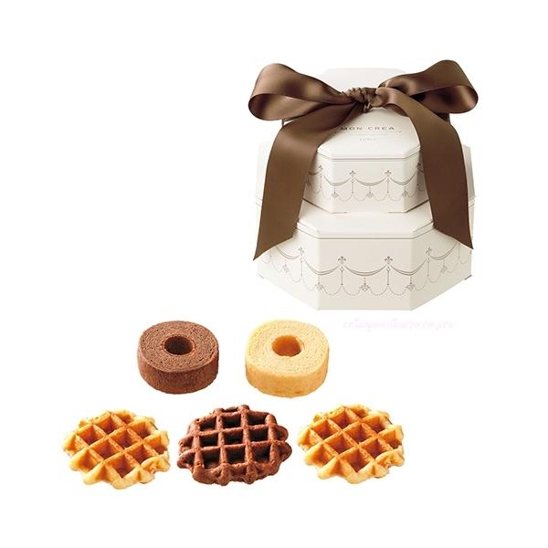 喜ばれる引き菓子・モンクレア　スイーツセットFリボンをほどくとそこには可愛らしいけど上品で落ち着いた味わいや香りがあります。お気に入りの飲み物やスイーツと一緒に・・・プレーンワッフル×2・ココアワッフル×1・ミルクバーム×1・チョコバーム×...