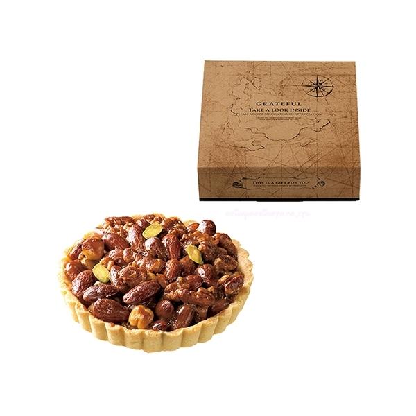 喜ばれる引き菓子・メラージュ　ヘーゼルナッツキャラメルタルトヘーゼルナッツキャラメルタルト1個入りです。ふたりの新たな旅路にふさわしいスイーツを香ばしいナッツをふんだんに使ったキャラメルタルトはふたりの航海を見守る人たちにスイートな幸せを運...