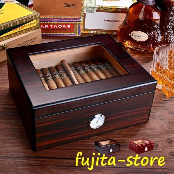 商品詳細:カラー:/A01/A02サイズ:/フリーサイズ商品説明◎湿度計と加湿器:透明な天窓は、箱の中の葉巻の状態を観察するのに役立ちます。 ◎葉巻に水分が不足している場合は、蒸留水を加湿器に直接注ぐことができます。 ◎パーティションストレ...