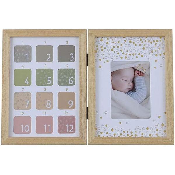 日々変わっていく成長を1ヶ月ごとに記録1年の成長、ペットやウェディングの思い出の記録にもナチュラルな木目の風合いと北欧調の柄がインテリアに馴染みます高級感のある箔押しの台紙が上品な雰囲気を演出します12個の窓とL判用の窓がついて1年間の思い...