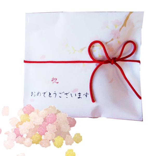 パッケージはオリジナルメッセージの印刷が可能。感謝の気持ちがグッと伝わります。きらきら輝くお星さまのような金平糖は、甘さと色合いがとても優しく仕上げられていて、おめでたい水引き風のリボンで結ばれたパッケージは春の訪れを告げる桜のイラスト入り...