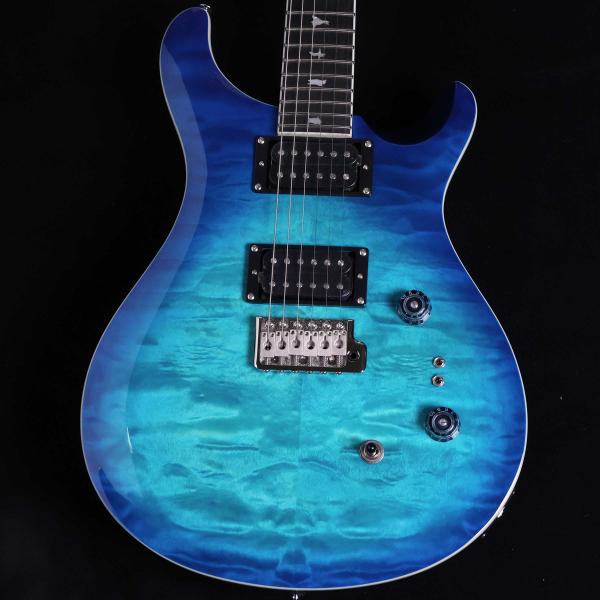SE Custom 24-08 Quiltは、オリジナルのCustom 24のメイプル・トップ、マホガニー・バック、ローズウッド指板、24フレット、25インチ・スケール、バード・インレイ、2基のハムバッカー、ヘッドのシグネチャー・ロゴ、そし...