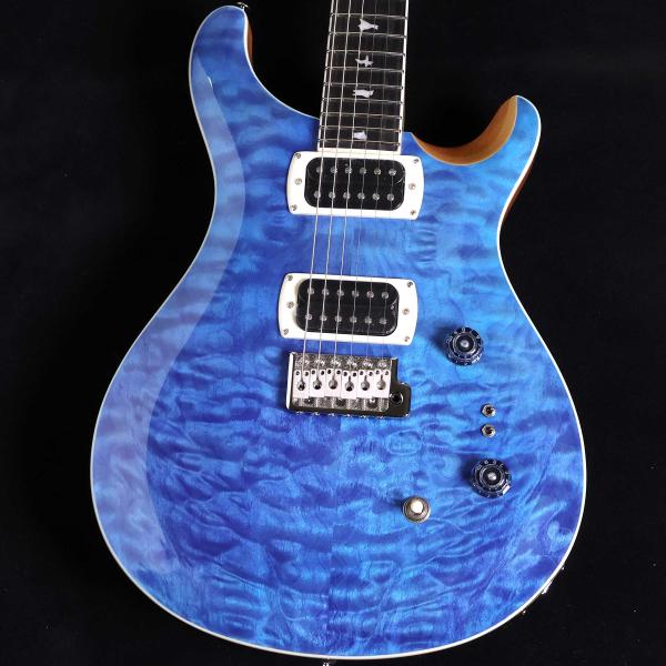 SE Custom 24-08 Quiltは、オリジナルのUSA製Custom 24のメイプル・トップ、マホガニー・バック、ローズウッド指板、24フレット、25インチ・スケール、バード・インレイ、2基のハムバッカー、ヘッドのシグネチャー・ロ...