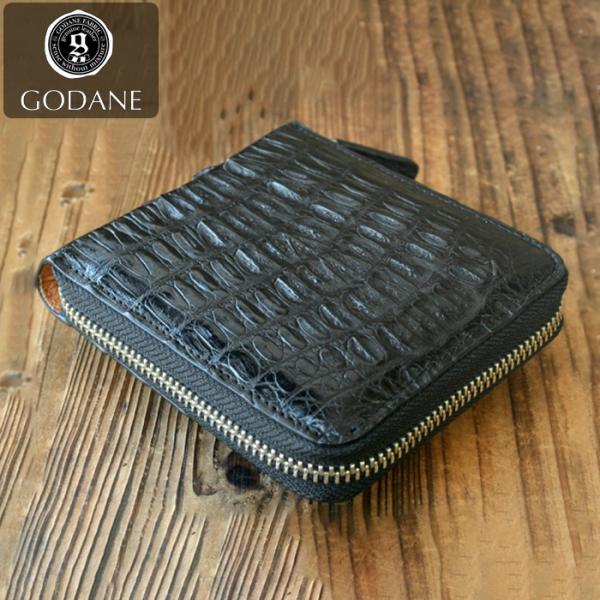 定番のラウンドジッパーのカイマン折財布長財布は大きすぎるでもジッパーのウォレットが欲しい方に素材はカイマンの背部分を使用し高級感を出している。カイマンレザーはオイル等のメンテナンスが不要。使い込むにつれワニ革は柔らかくなり、艶々と良い味が出...