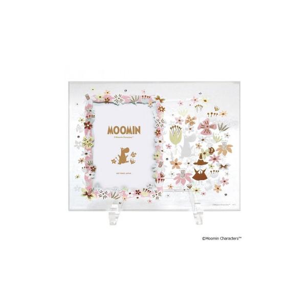 ムーミン グラスフレーム サービスL フラワー FC110442 ラメのきらめき感とガラスの透け感が美しい、ムーミンのフォトフレームです。 生産国:日本 素材・材質:本体:ガラス、樹脂、スワロフスキークリスタルスタンド:アクリル 商品サイズ...