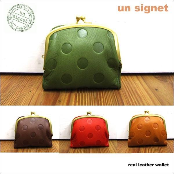 上質な国産レザーに大きめのポップで可愛い水玉ドットを型押ししたがま口二つ折り財布！ふっくらコロンとしたフォルムも可愛いメイドインジャパンのハーフウォレット！上質なふんわり柔らかいカウレザーを使用しました。シンプルで飽きのこないベーシックなデ...