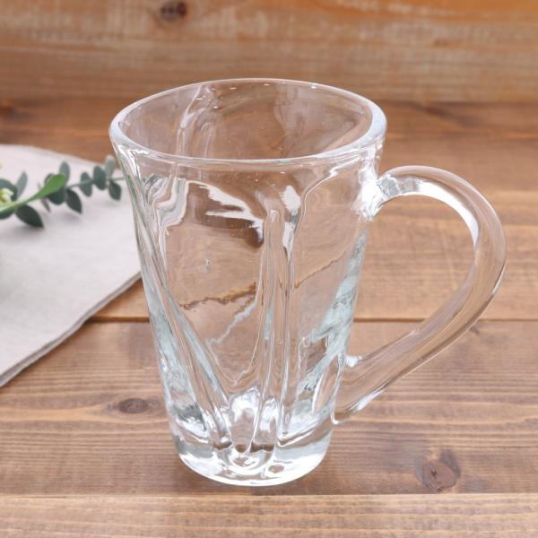 商品説明手吹きの手作り感が味わい深い、透き通ったさわやかなガラス製ジョッキ。こちらは410ccでごくごく飲めるスタンダードなビールジョッキのサイズです。商品詳細サイズ／口径9.3×12.7（持ち手含む）×高さ12.4cm重さ／約345g容量...