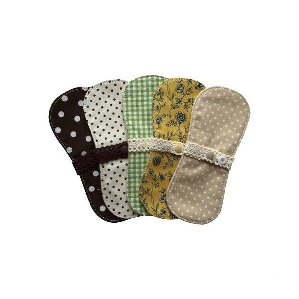 手のひらサイズのスリムなオーガニックコットンライナー5枚セットです。肌に触れる面にオーガニックコットン茶ガーゼ生地を使用したおりもの用のスリムなパンティーライナー5枚セットです。表の柄面は一般綿で、裏の肌に当たる綿はオーガニックコットンガー...