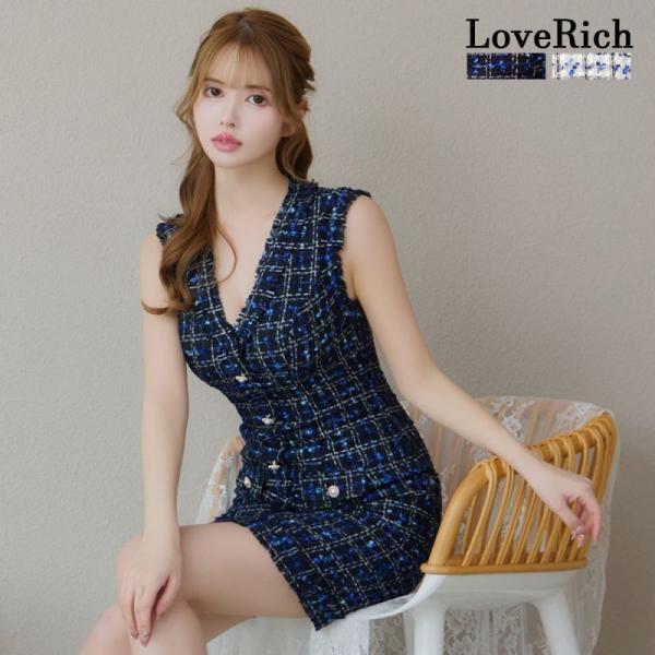 華やかさとエレガンスを兼ね備えた魅力的なツイードドレスです。ツイード素材の上品さと、パールボタンがさりげないアクセントとなり、上品かつ洗練された印象を演出しています。Vカット襟は谷間を美しく見せるデザインで、女性らしい魅力を引き立てます。ま...