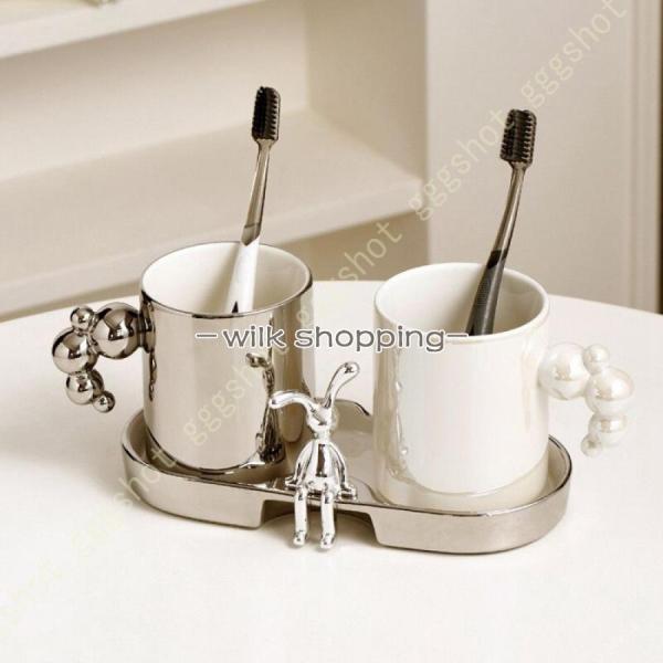 商品の説明◆材質：セラミック素材◆カラー：写真通り◆製品：A=歯ブラシホルダー×1、歯磨きコップ×2。B=歯磨きコップ×1。空気の柱で包装されています。具体的なサイズは写真の説明を見てください。歯ブラシや歯磨き粉などの物は含めておりません。...