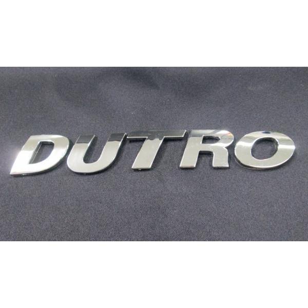 メッキのABCエンブレム車種名：DUTRO（デュトロ）表面をラウンドさせたデザインで、立体感を強調してます！取り付けは両面テープになります。【注意事項】・縦は約26ｍｍですが、幅は文字によって異なります。・型キズ等ございますのでご了承くださ...