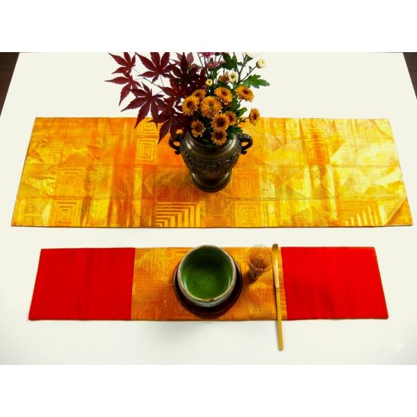 ■画像にある小物(ハンガーや花など)は商品に含まれません。◆帯のリメイク品になります。■サイズ---約【cm】幅30.5　長さ約106・幅16　長さ86の2枚セットでの価格設定です。■帯としての使用感が少なく綺麗です。鮮やかなオレンジがかっ...