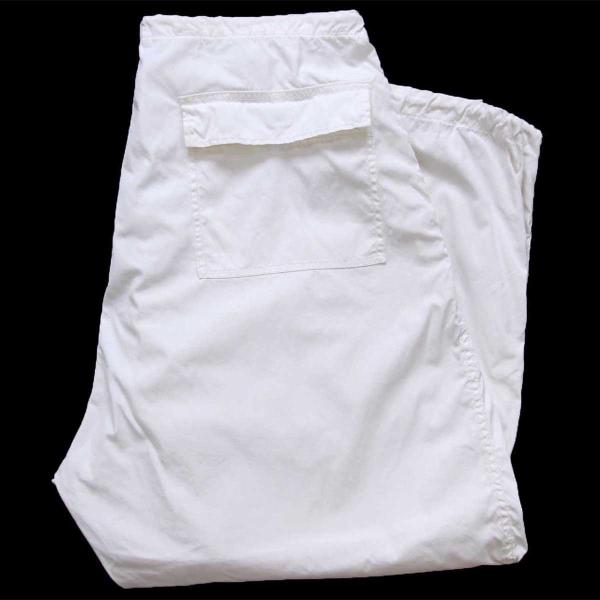 90年 U.S.ARMY【TRS, SNOW, CAM, WHITE】オーバーパンツです。EQUA INDUSTRIES,INC.製パンツの上から履くオーバーパンツで両サイドのポケットは貫通ポケットです。ウエストと裾に紐あり、フロントIDE...