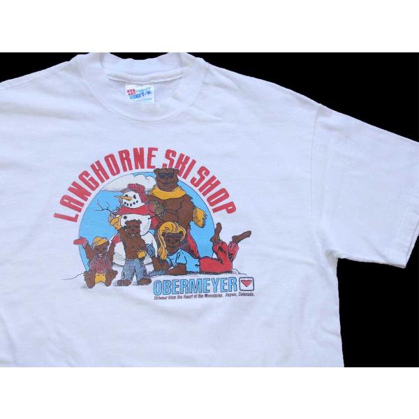 90s【Hanes】のTシャツです。MADE IN USA袖、裾ともにシングルステッチカラー：白素材：100% COTTONサイズ表記：MEDIUM実寸（平置き）・肩幅　48cm・身幅　49.5cm・着丈　69cm多少の誤差はご了承ください...