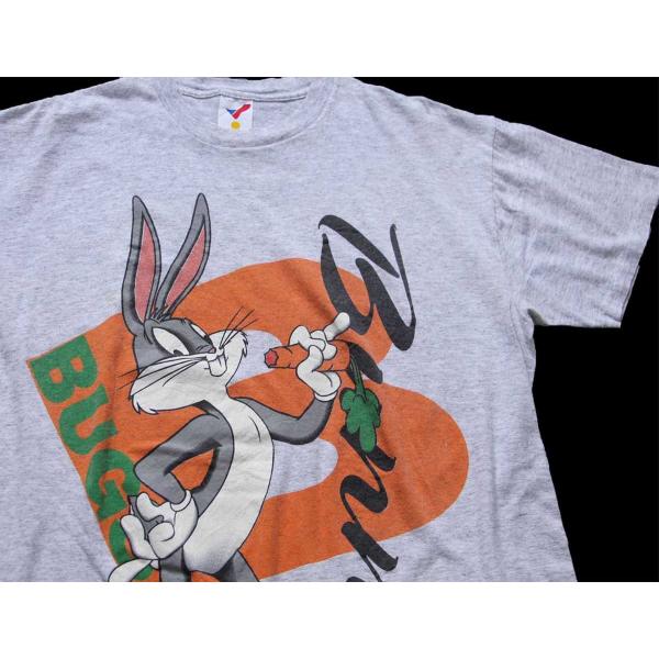 90s【ARTEX SPORTSWEAR】のTシャツです。MADE IN USA1993 Warner Brosのコピーライトあり袖、裾ともにシングルステッチカラー：杢ライトグレー素材：100% COTTONサイズ表記：L実寸（平置き）・肩...