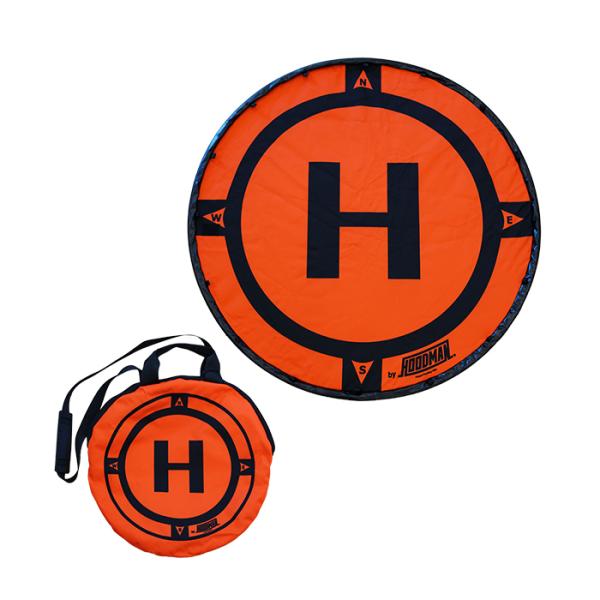 直径92cmの汎用離着陸パッド。キャリーバッグから取り出すと即座に広がります。離発着地点が誰が見ても分かります。砂塵が舞い上げられるのを防ぎ、レンズやモーターを守ります。ドローンが飛行可能な環境で風に飛ばされることはありません。重量:1.8kg